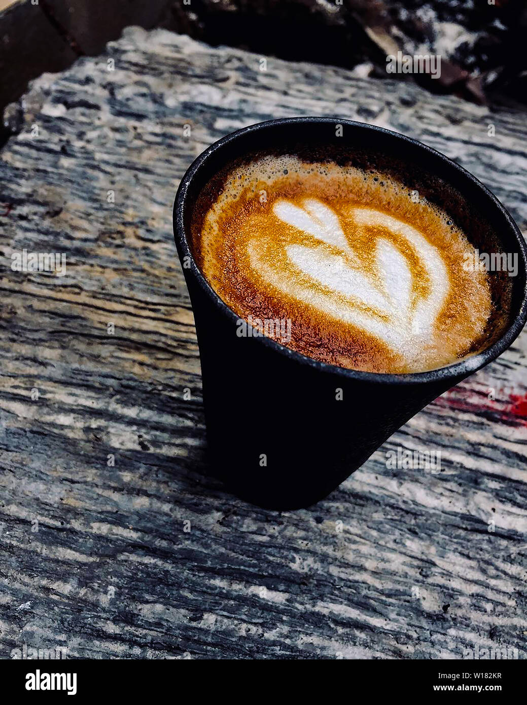 cup of coffee latte on dark wood table, beautiful latte art Stock Photo ...