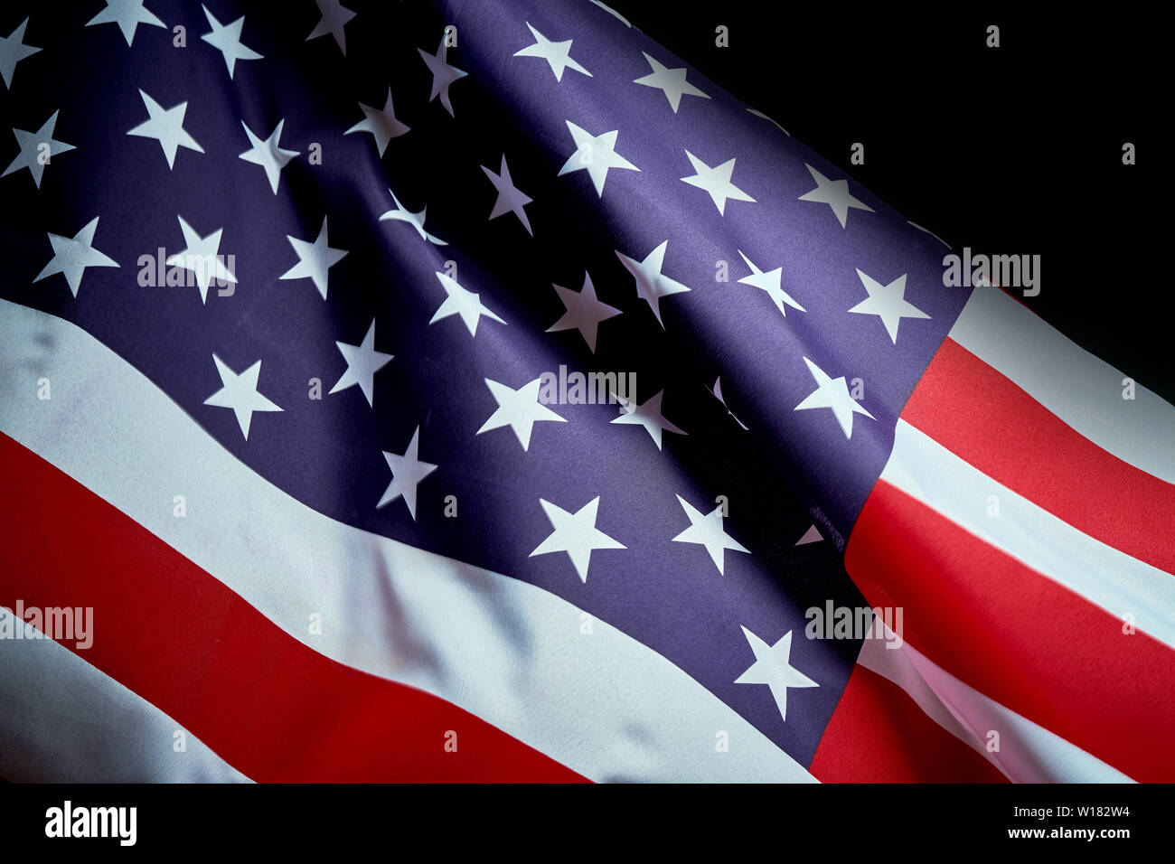 US flag waving in wind on Independence Day in America Stock Photo - Alamy