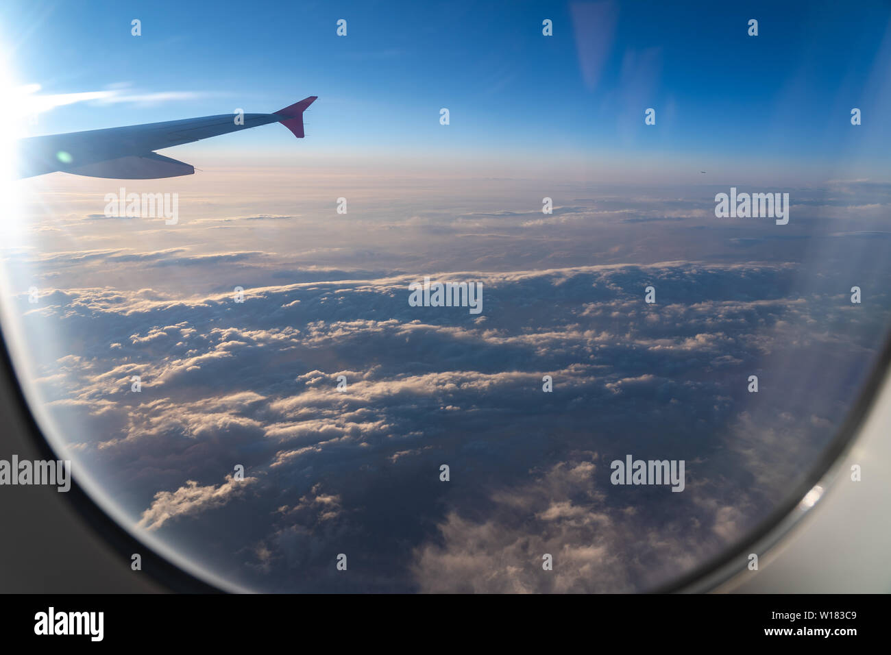The window of the airplane. A view of porthole window on board an ...