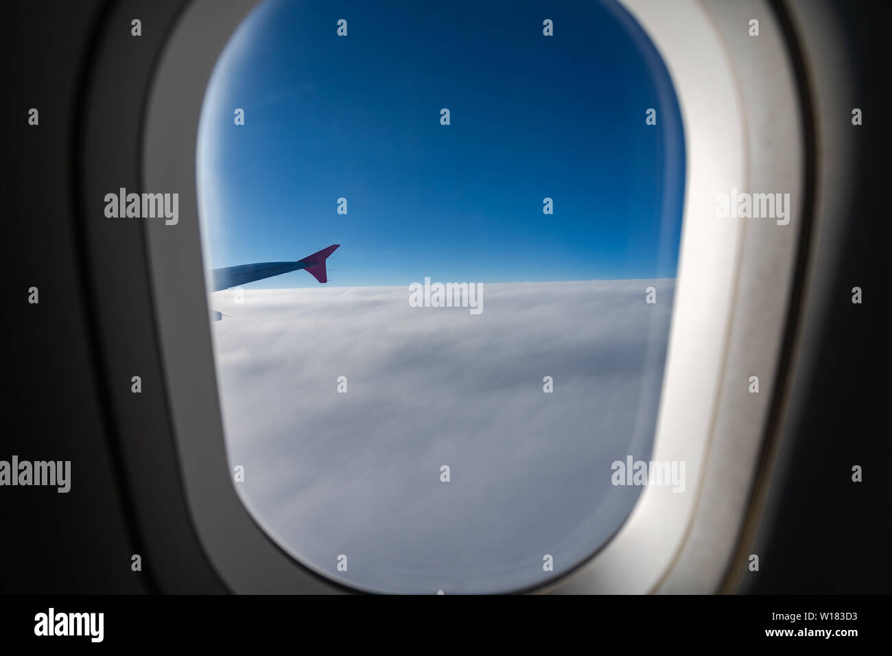 The window of the airplane. A view of porthole window on board an ...