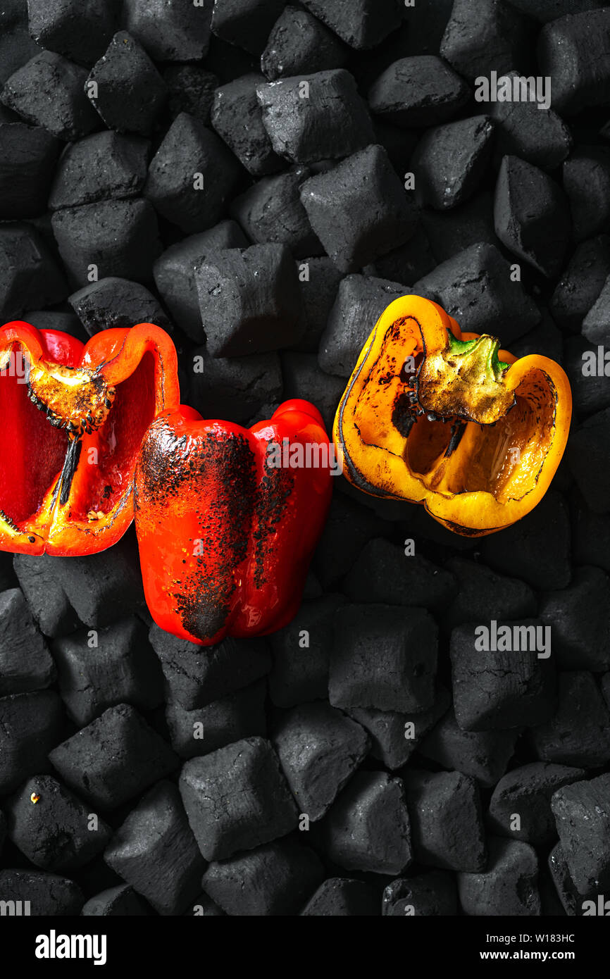 Cooked on grilled pepper over a charcoal top view Stock Photo - Alamy