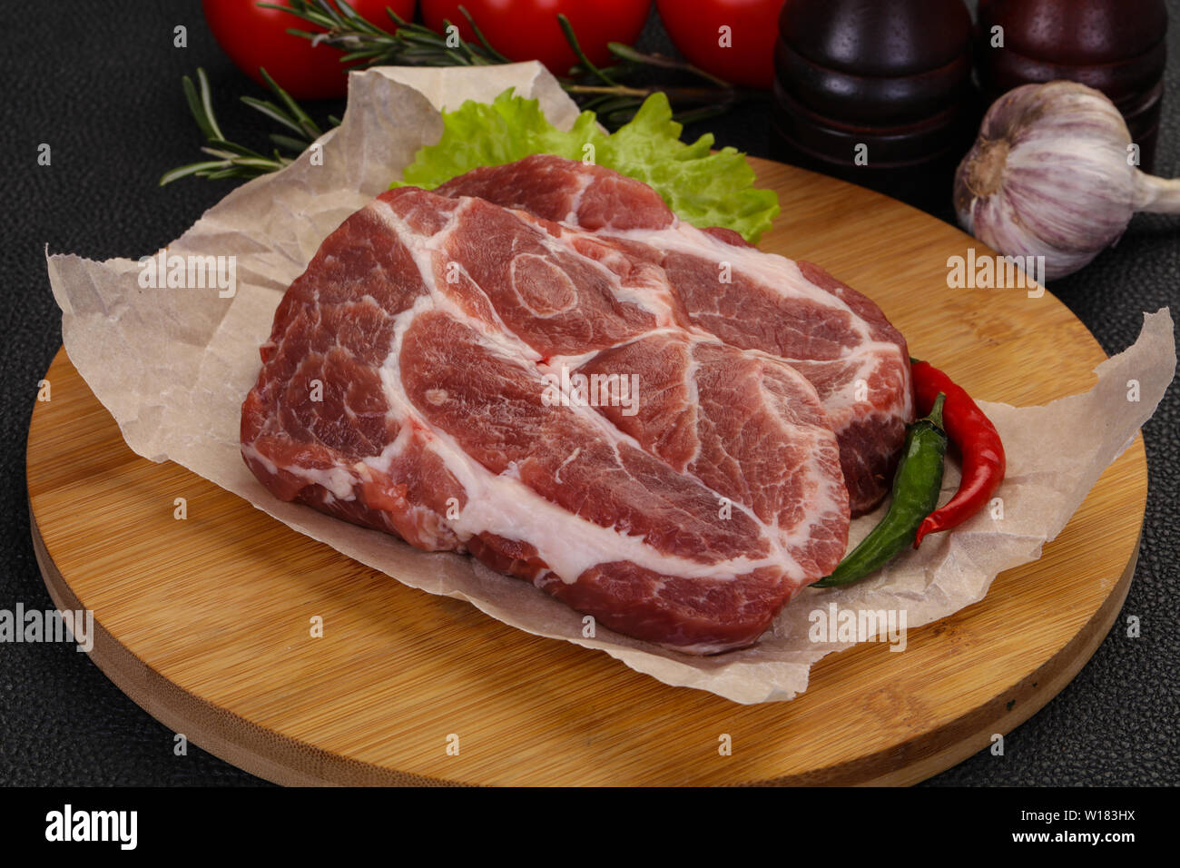 Raw pork neck steak ready for cooking Stock Photo - Alamy
