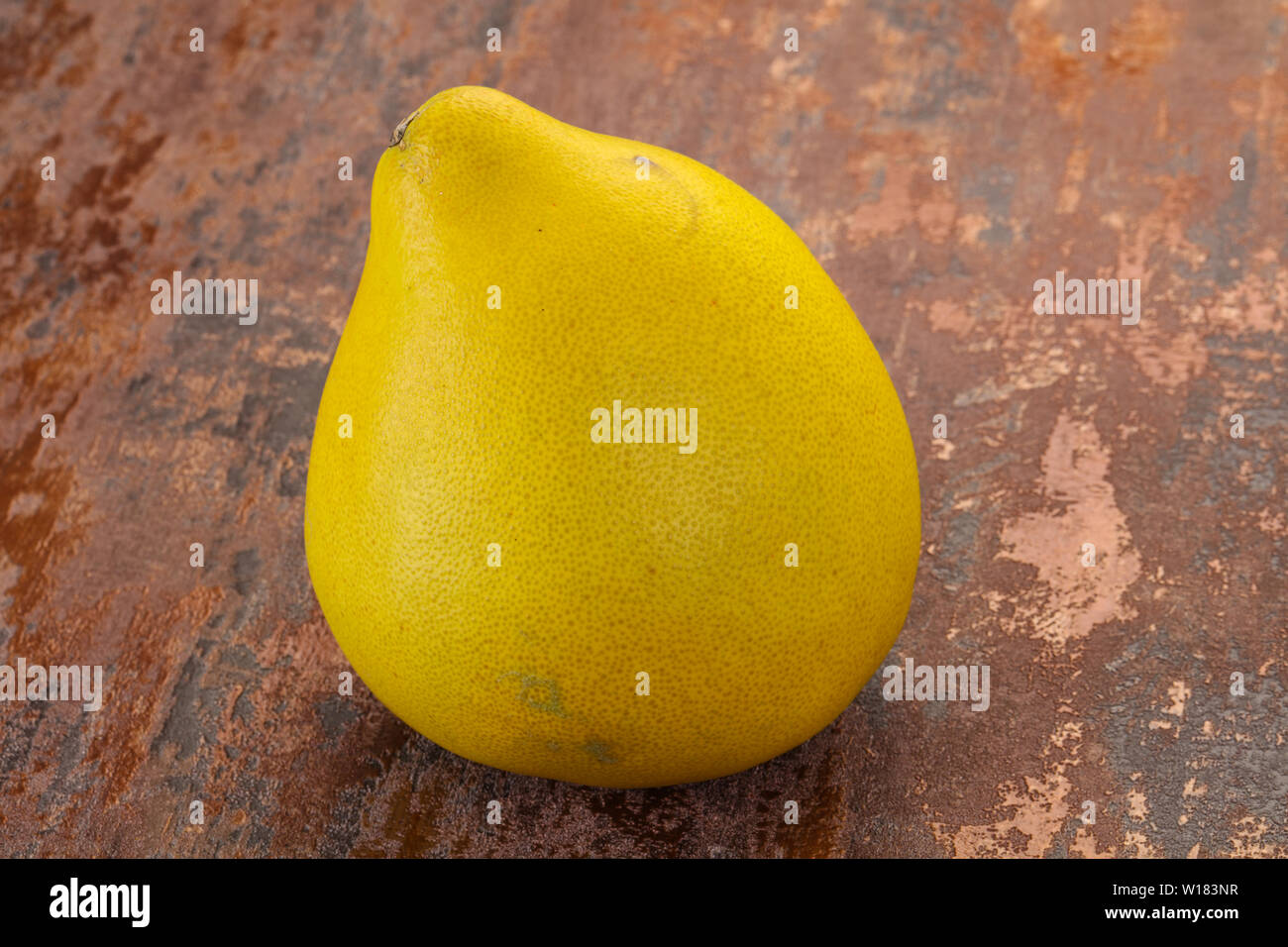 Ripe fresh Pomelo fruit over the wooden background Stock Photo - Alamy