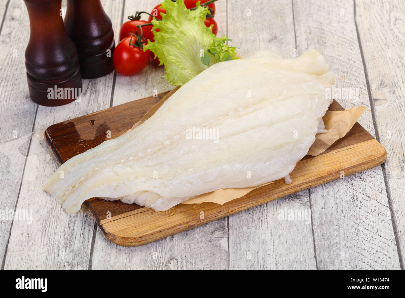 Raw halibut fillet ready for cooking Stock Photo - Alamy