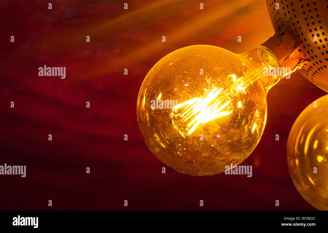 shining yellow light, power bulb background Stock Photo - Alamy