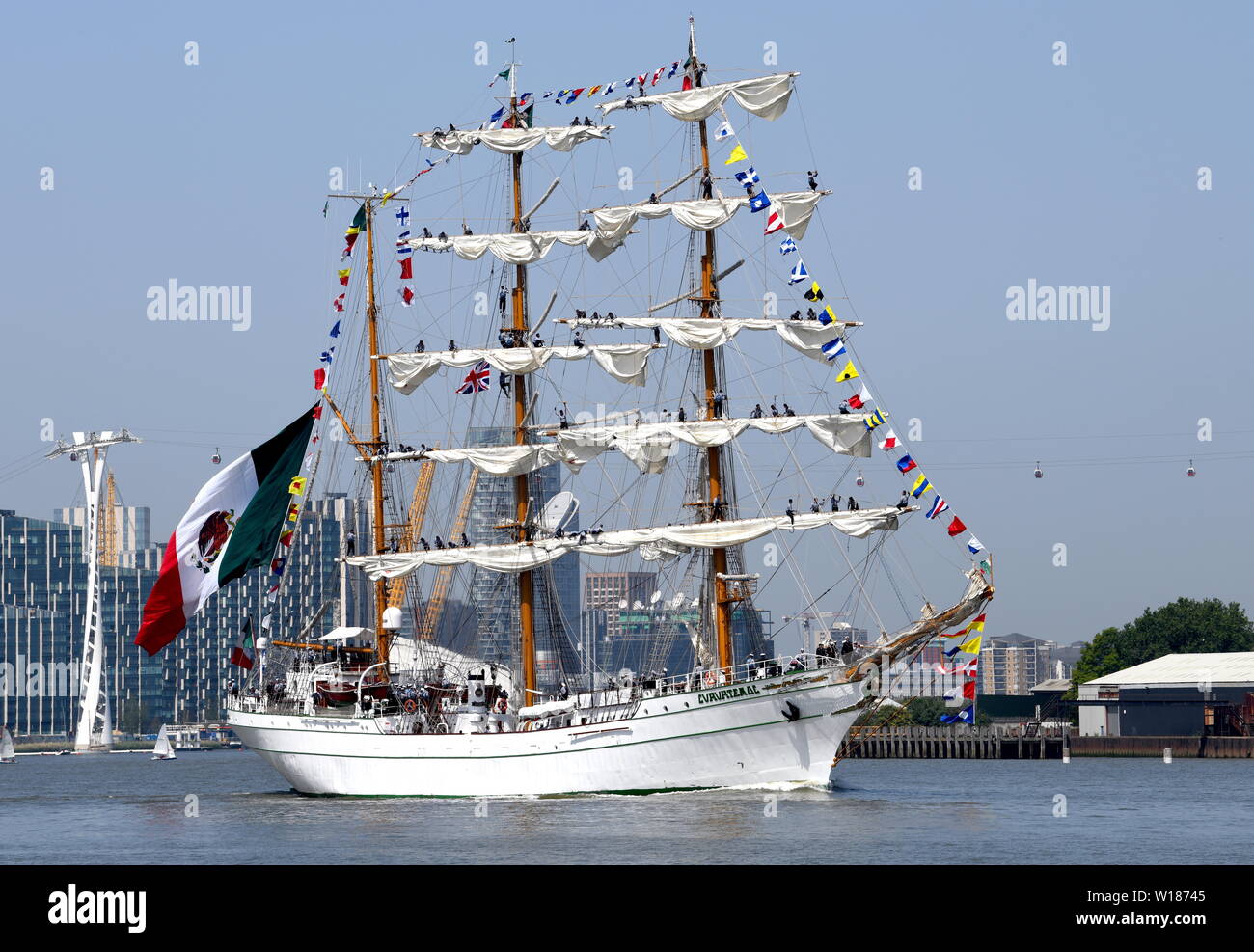 Mexican Navy tall ship Cuauhtémoc, with crew on the yard arms 45m above ...