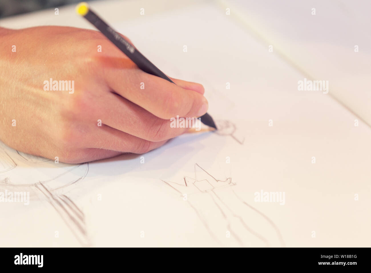 Female hand drawn on white paper Stock Photo - Alamy