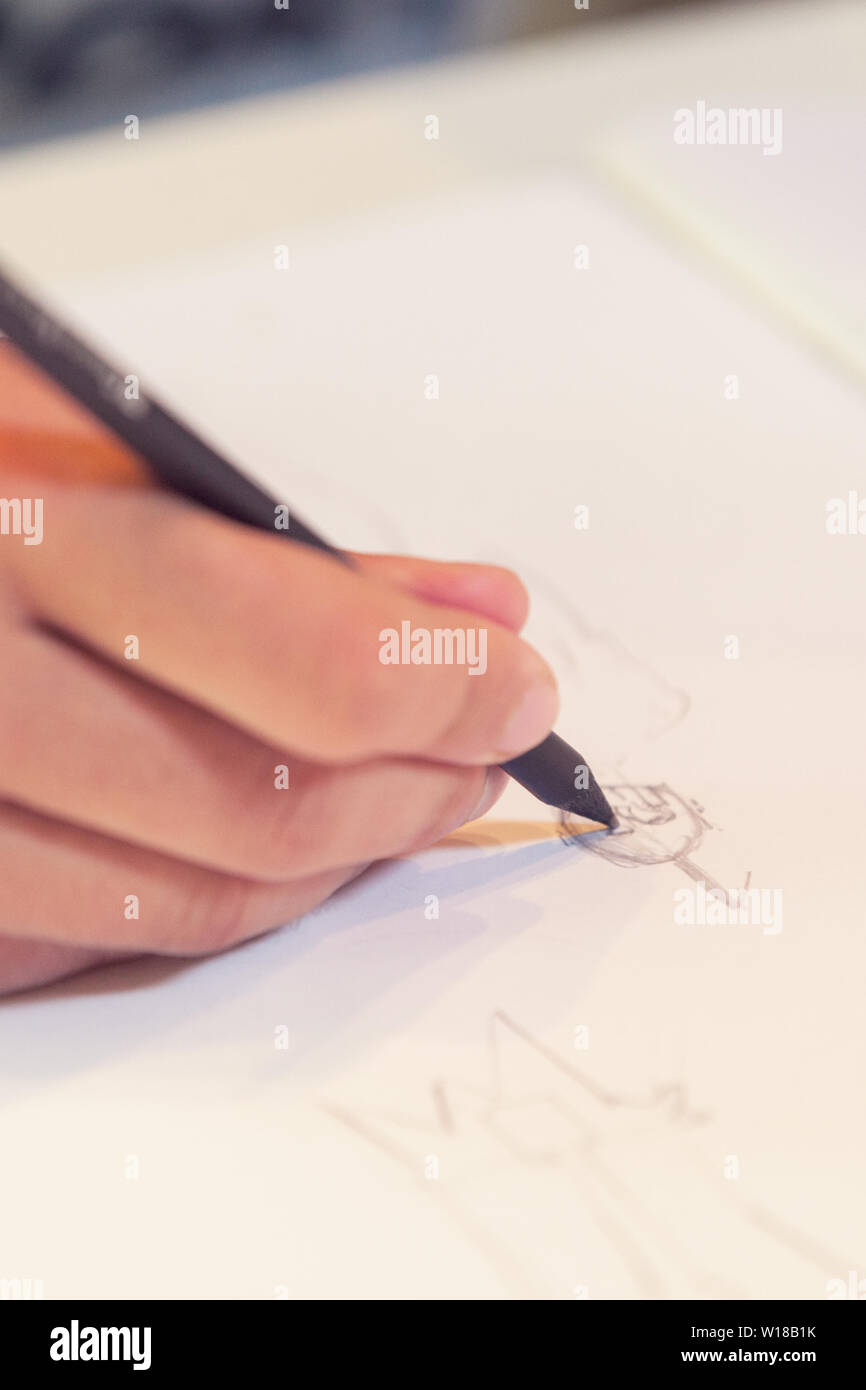 Female hand drawn on white paper Stock Photo - Alamy