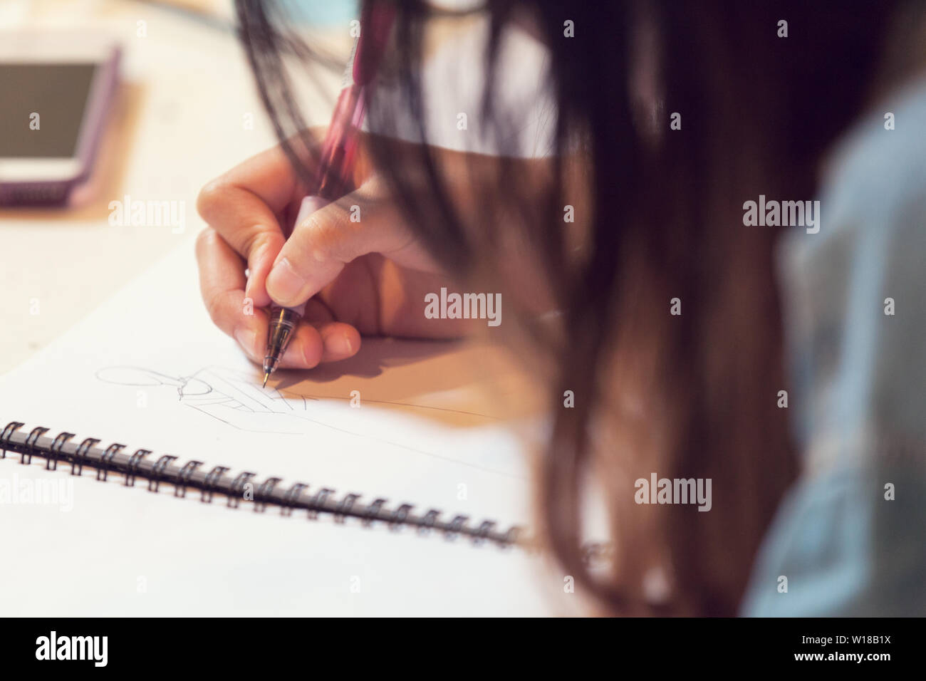 Female hand drawn on white paper Stock Photo - Alamy