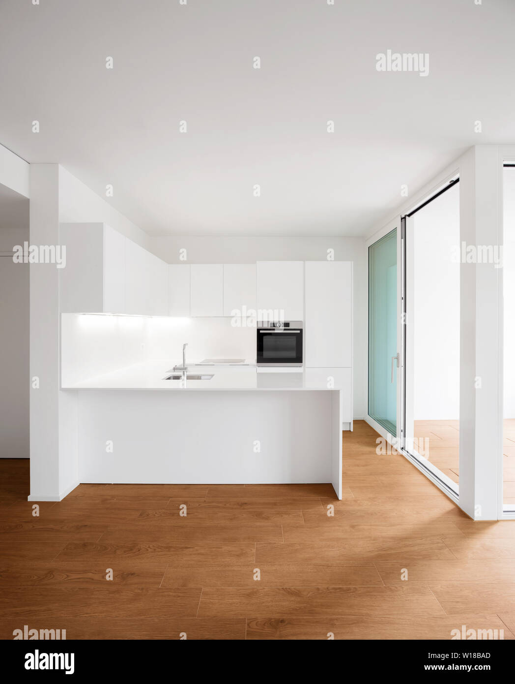 Interior of modern apartment with wooden floor Stock Photo - Alamy
