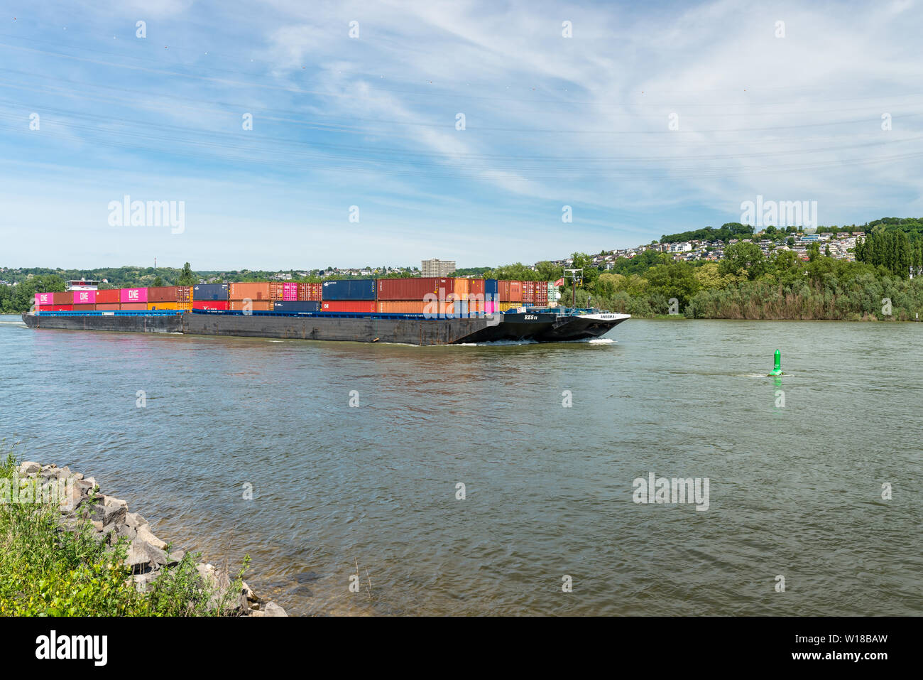 Barge carrying shipping containers hi-res stock photography and images ...