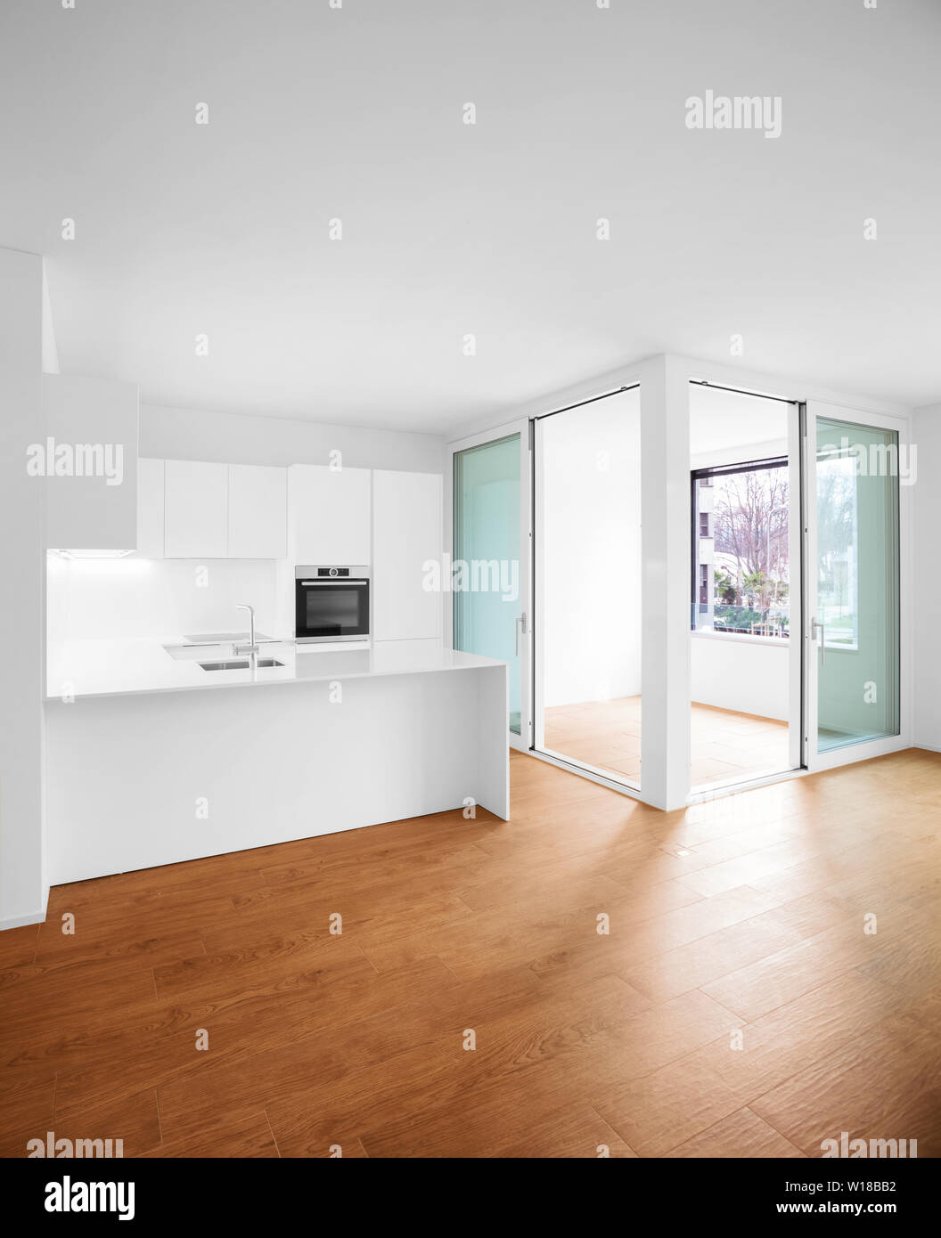 Interior of modern apartment with wooden floor Stock Photo - Alamy