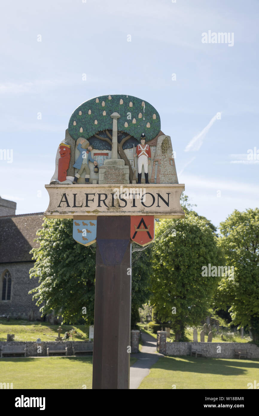 the village sign of alfriston in east sussex Stock Photo - Alamy