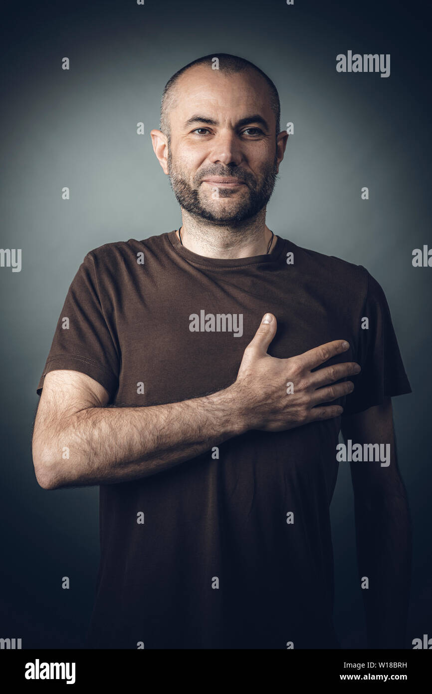 Chest and hands hi-res stock photography and images - Alamy