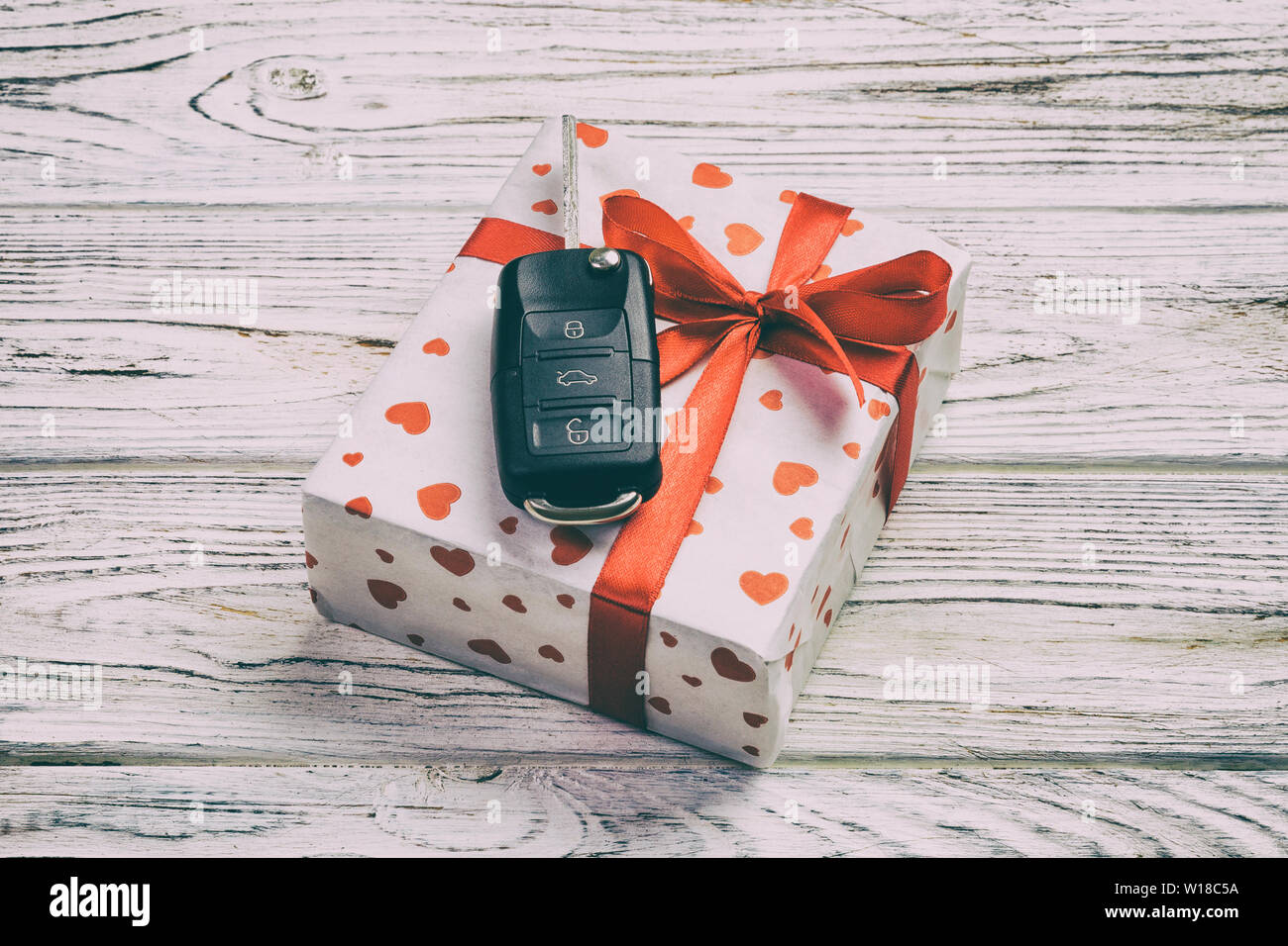 Valentine or other holiday handmade present in paper with red hearts ...