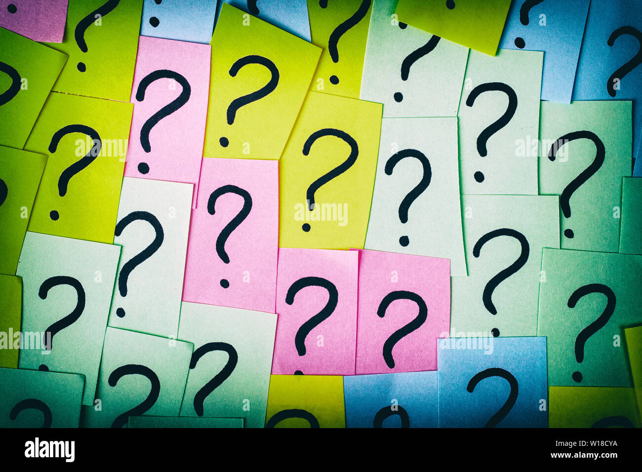 Question marks background. Colorful paper notes with question marks ...