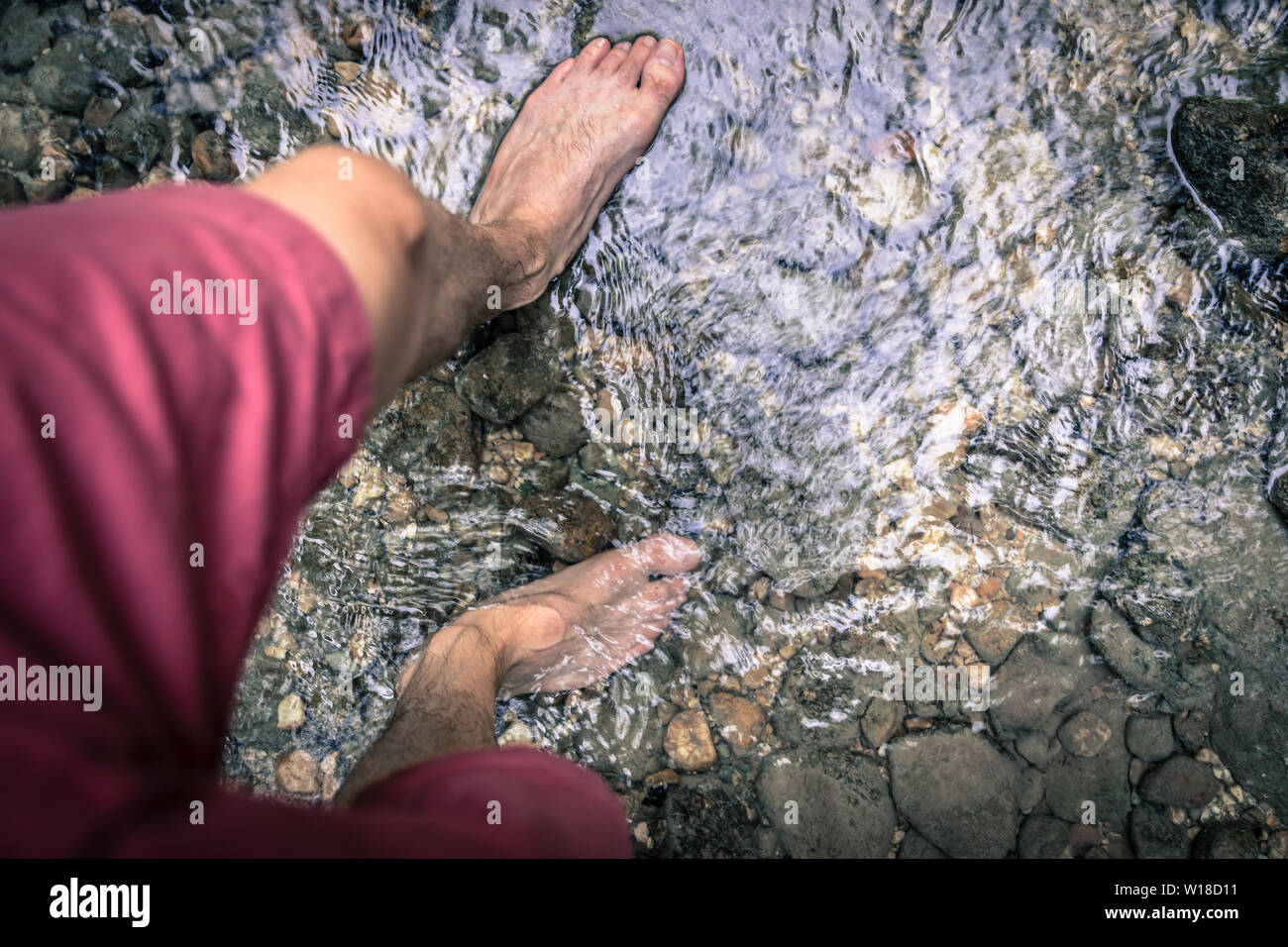 Feet in shallow river hi-res stock photography and images - Alamy