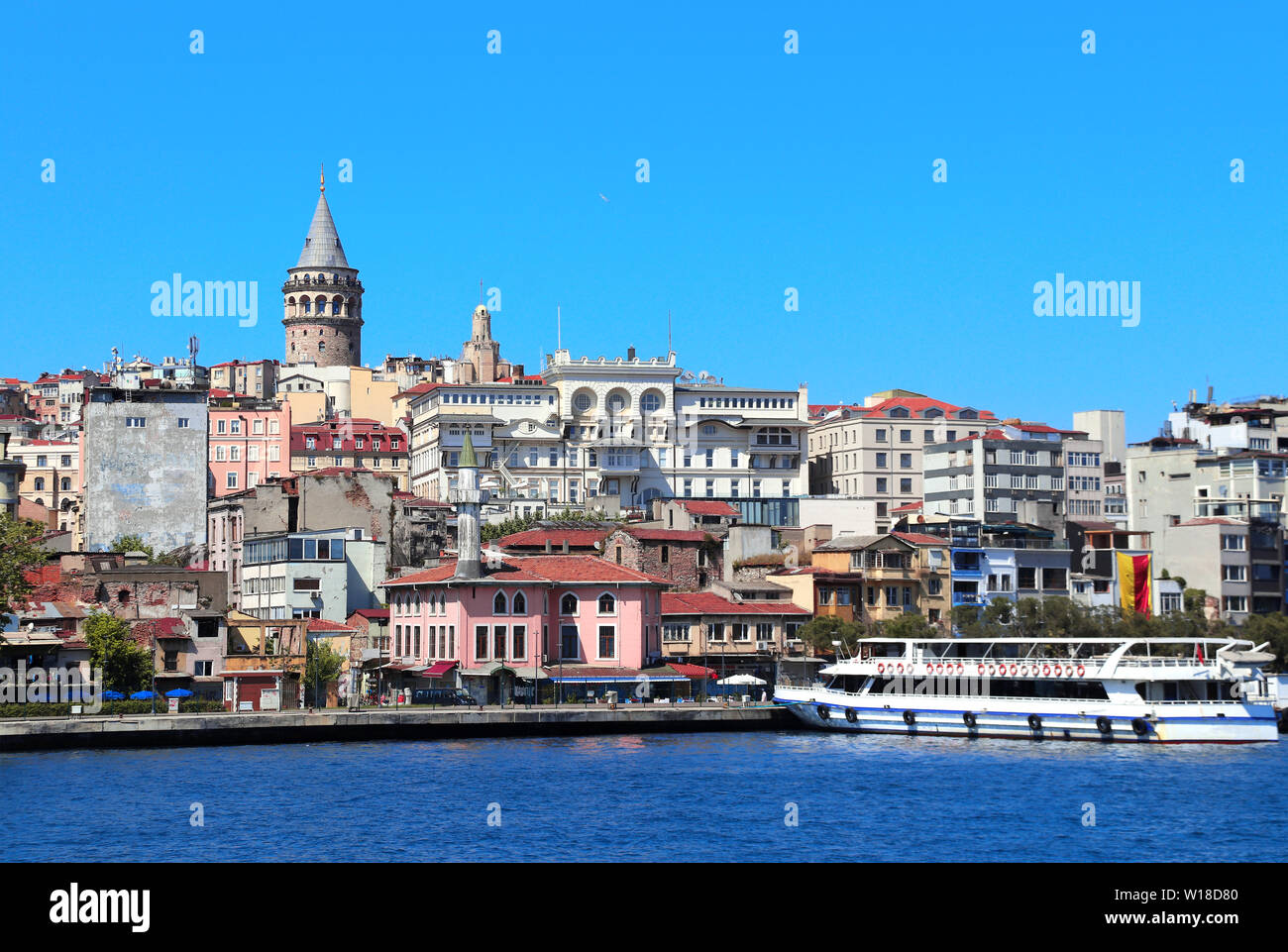 View from water on Galata Tower and Beyoglu district, Istanbul, Turkey ...