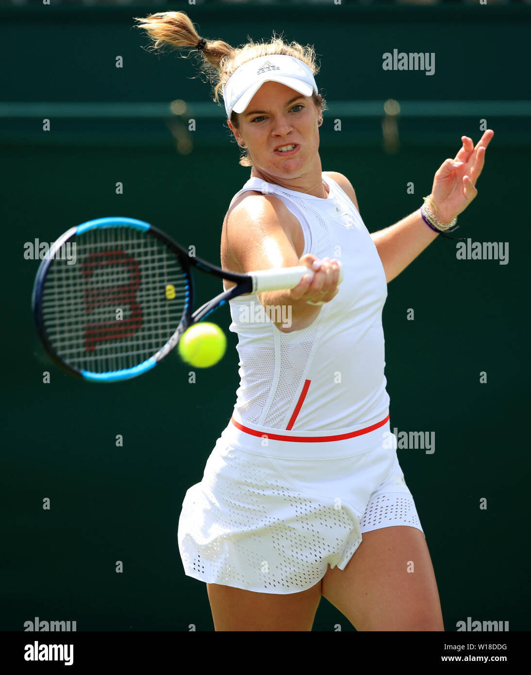 Caty McNally in action on day one of the Wimbledon Championships at the ...