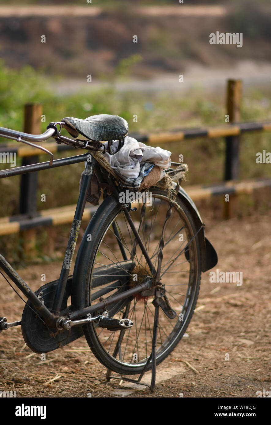 Farmers Bicycle parked next to his paddy field at Srirangapatna ...
