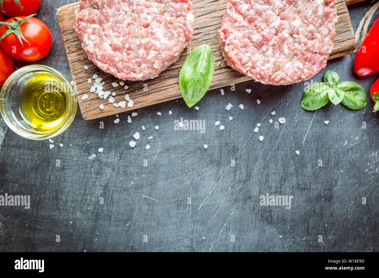 Fresh raw burger patties Stock Photo - Alamy