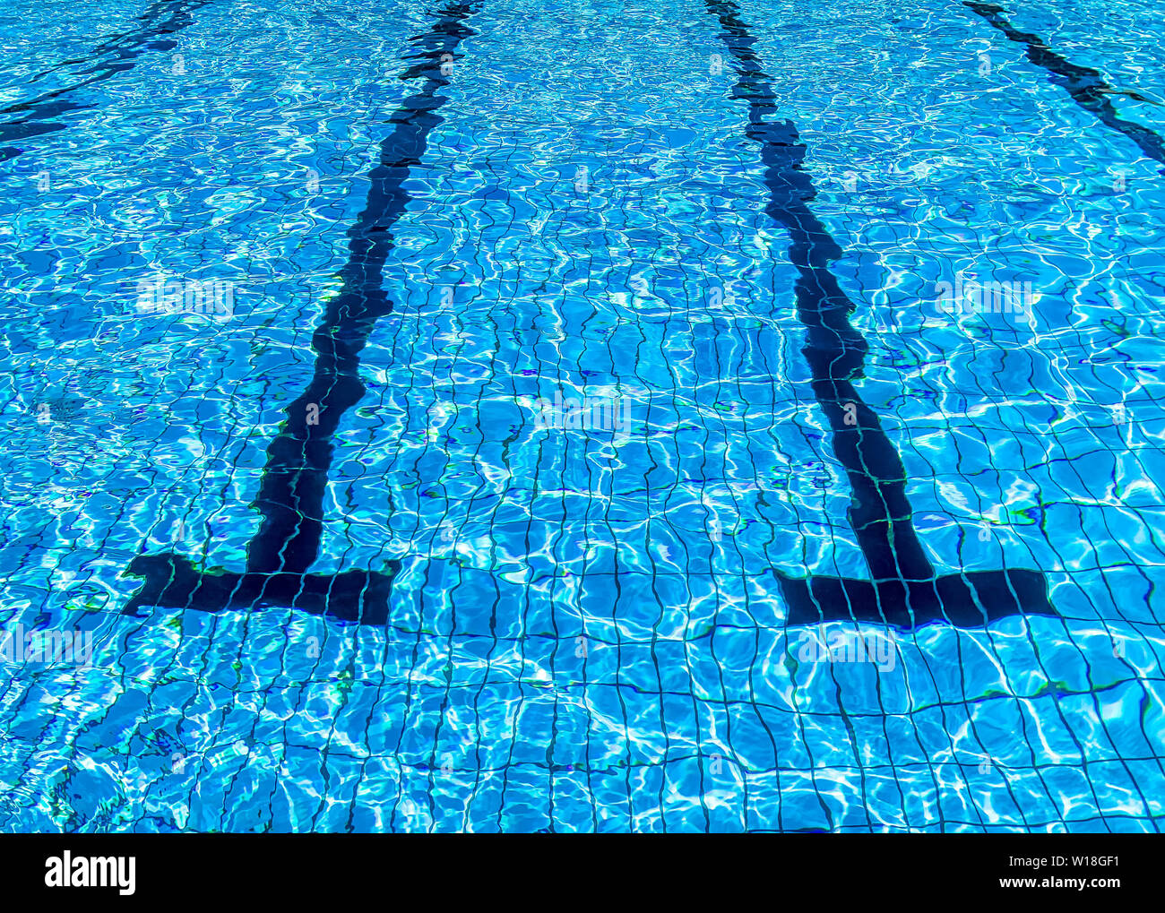 swimming race sports pool blue water background Stock Photo - Alamy