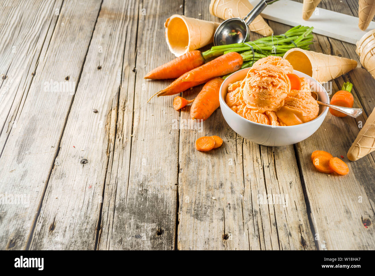 Vegetable gelato. Vegan carrot ice cream with organic baby carrots, old ...