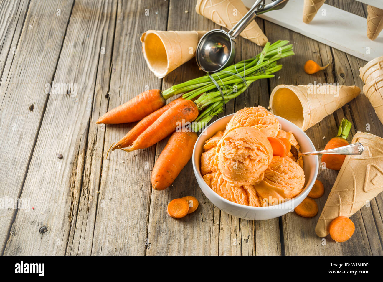 Vegetable gelato. Vegan carrot ice cream with organic baby carrots, old ...