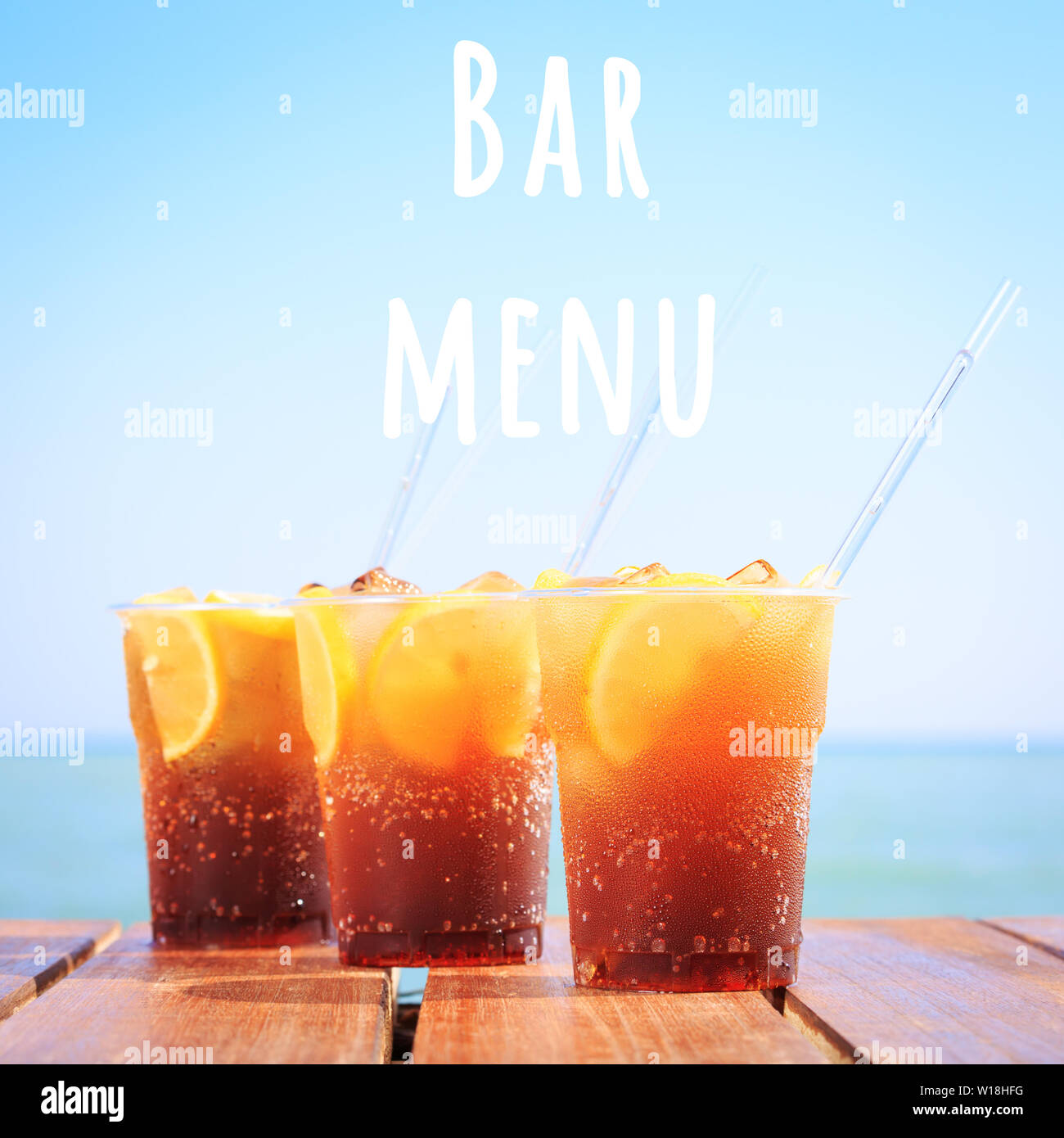 Concept of luxury tropical vacation. Cuba Libre or long island iced tea ...