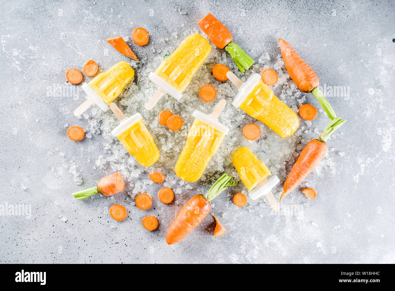 Vegetable gelato. Vegan carrot ice cream popsicles with organic baby ...