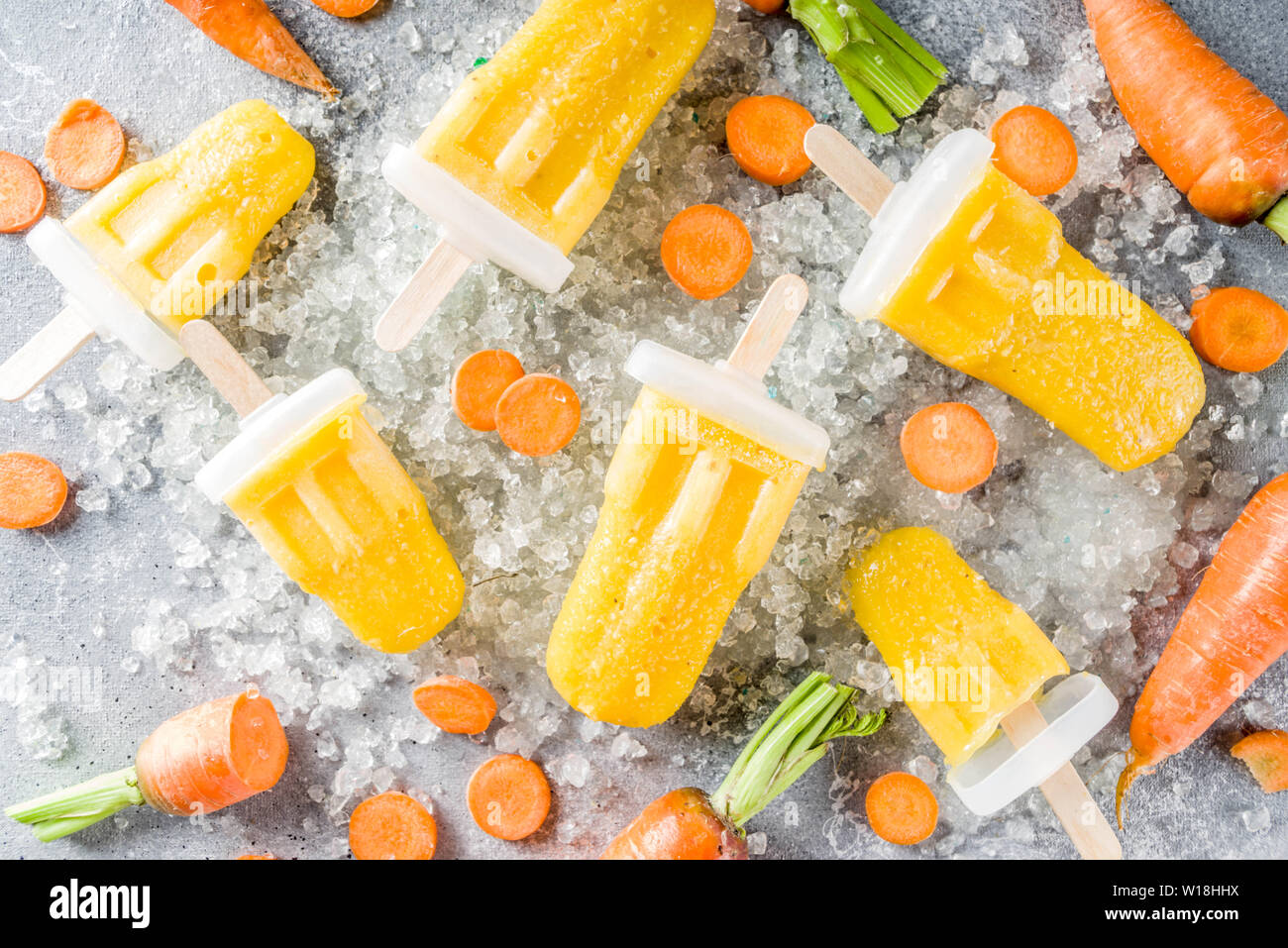 Vegetable gelato. Vegan carrot ice cream popsicles with organic baby ...