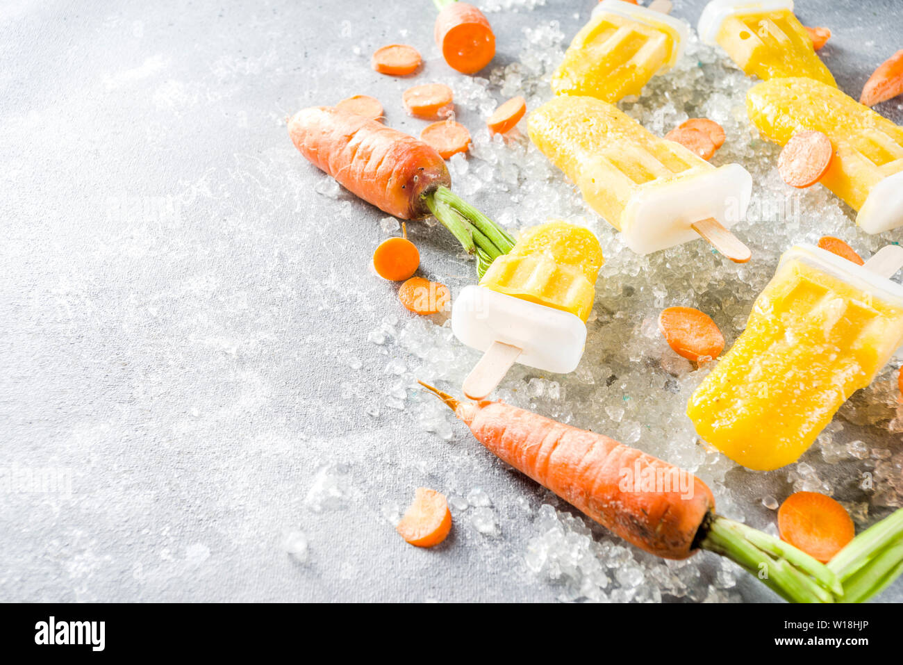 Vegetable gelato. Vegan carrot ice cream popsicles with organic baby ...