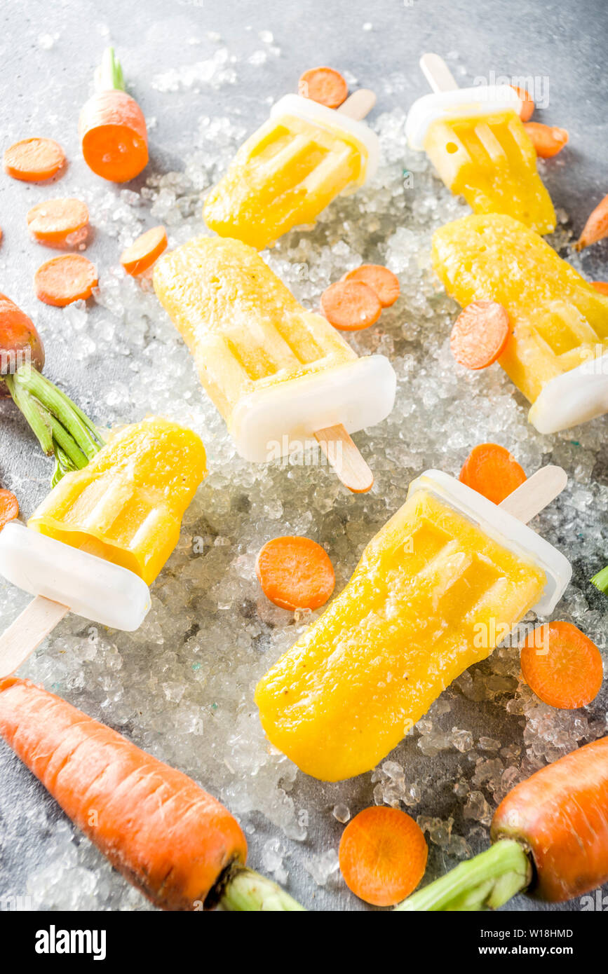Vegetable gelato. Vegan carrot ice cream popsicles with organic baby ...