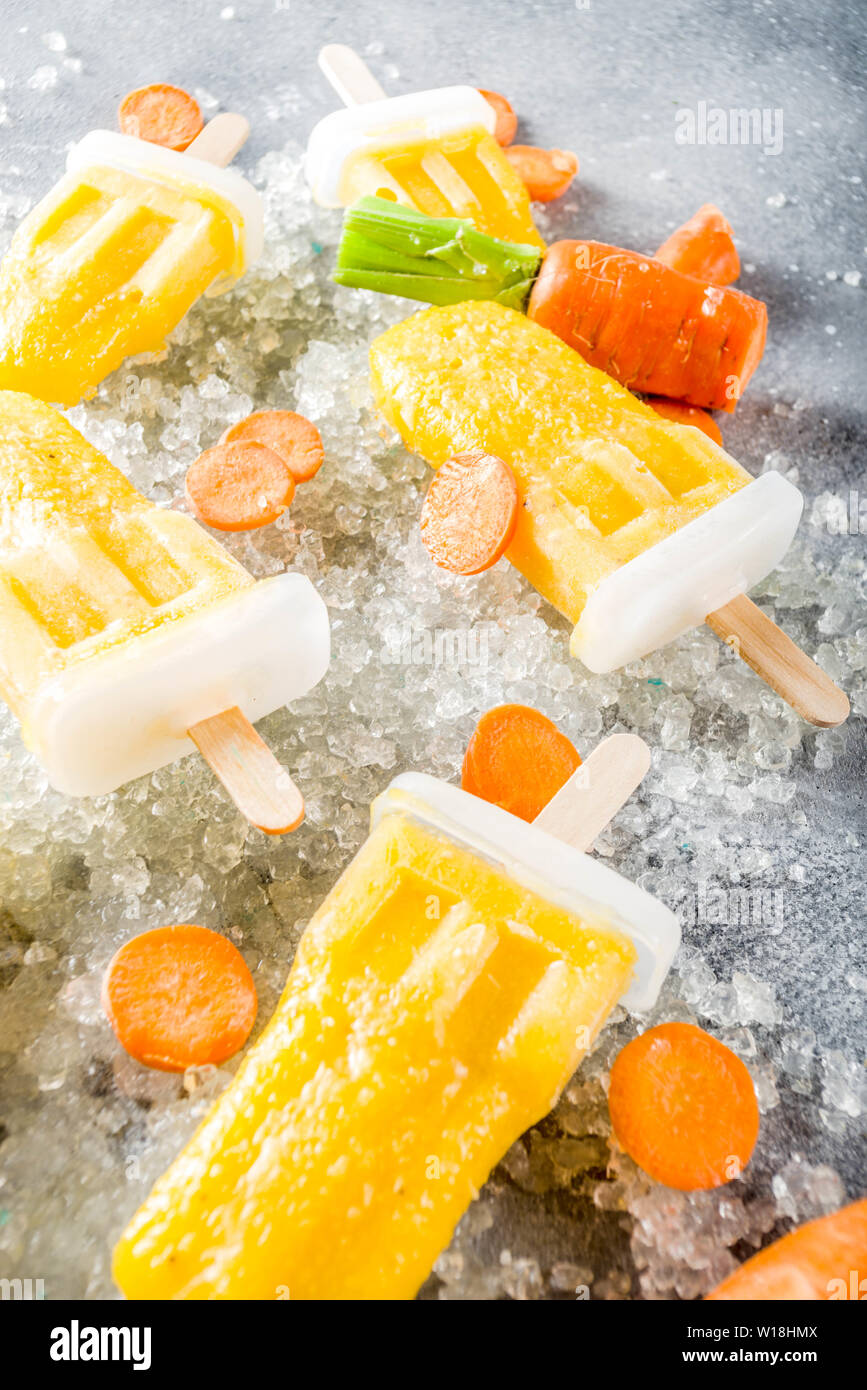 Vegetable gelato. Vegan carrot ice cream popsicles with organic baby ...