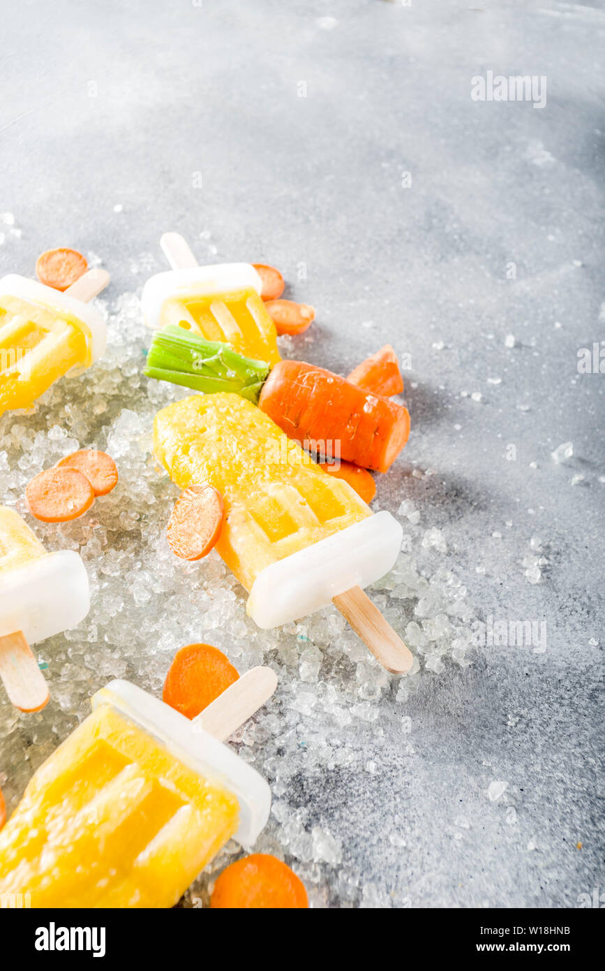Vegetable gelato. Vegan carrot ice cream popsicles with organic baby ...
