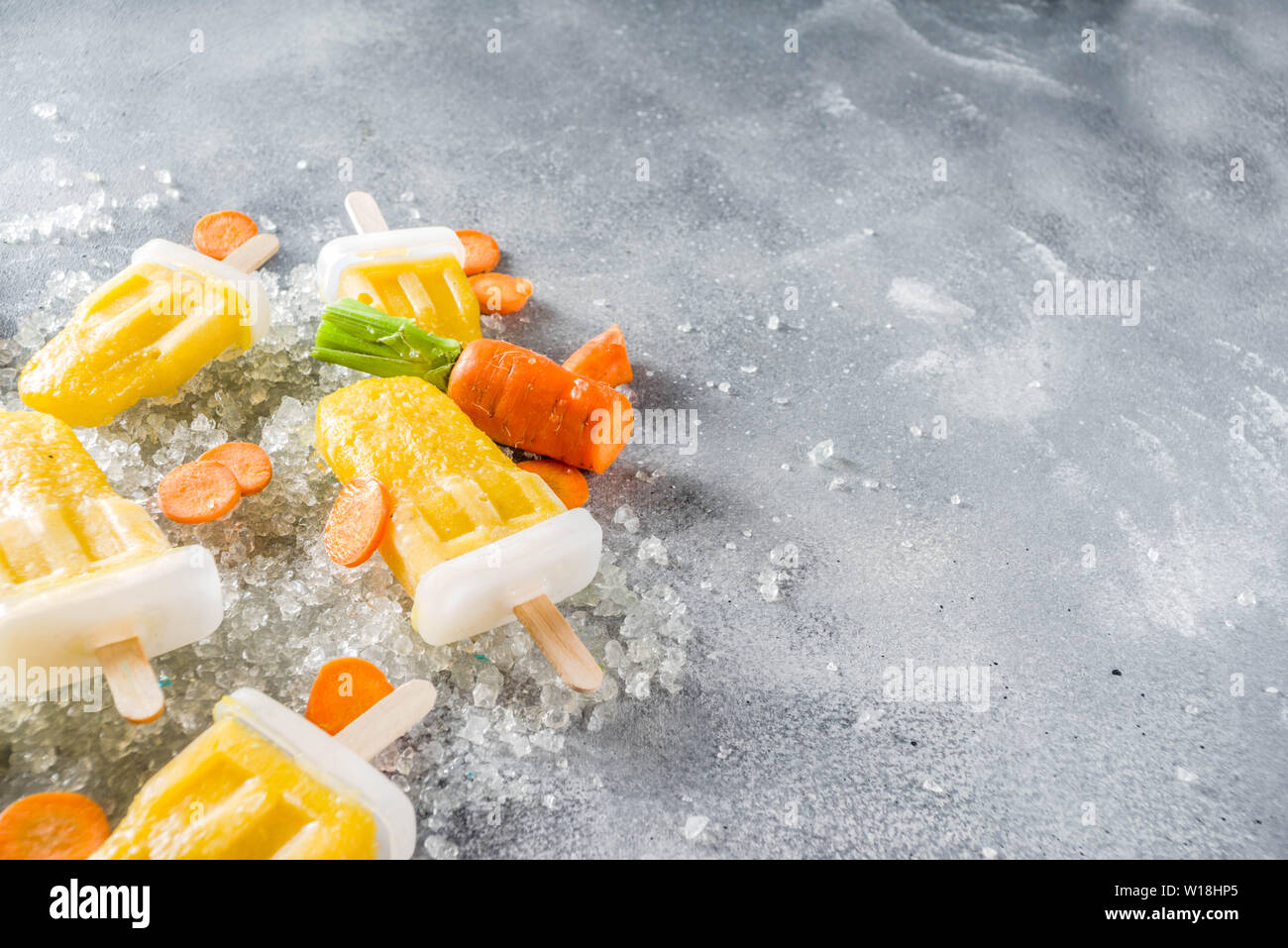 Vegetable gelato. Vegan carrot ice cream popsicles with organic baby ...