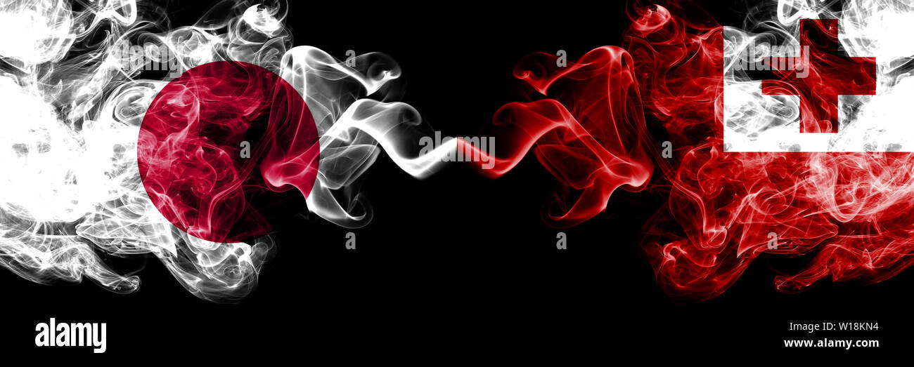 Japan vs Tonga, Tongan smoky mystic flags placed side by side. Thick ...