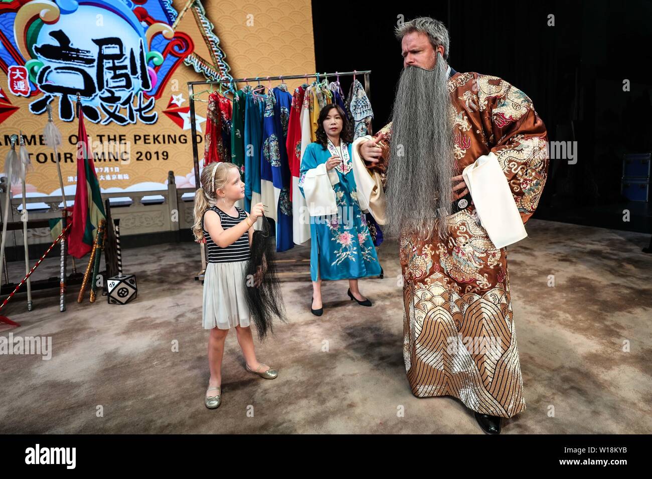 Dalian, China's Liaoning Province. 1st July, 2019. Guests try the ...