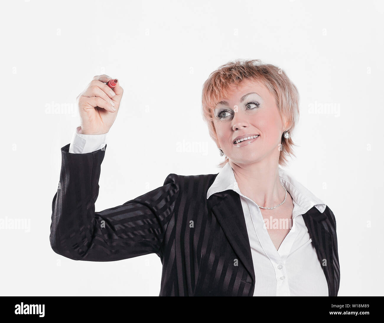 modern business woman pointing at a virtual point.isolated on white ...