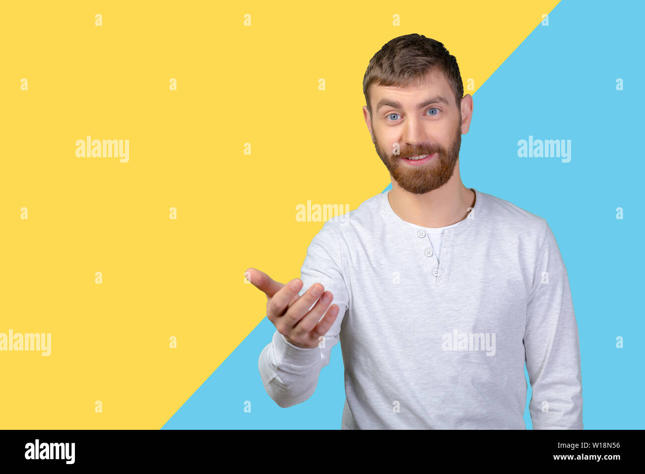 Beckoning sign hi-res stock photography and images - Alamy