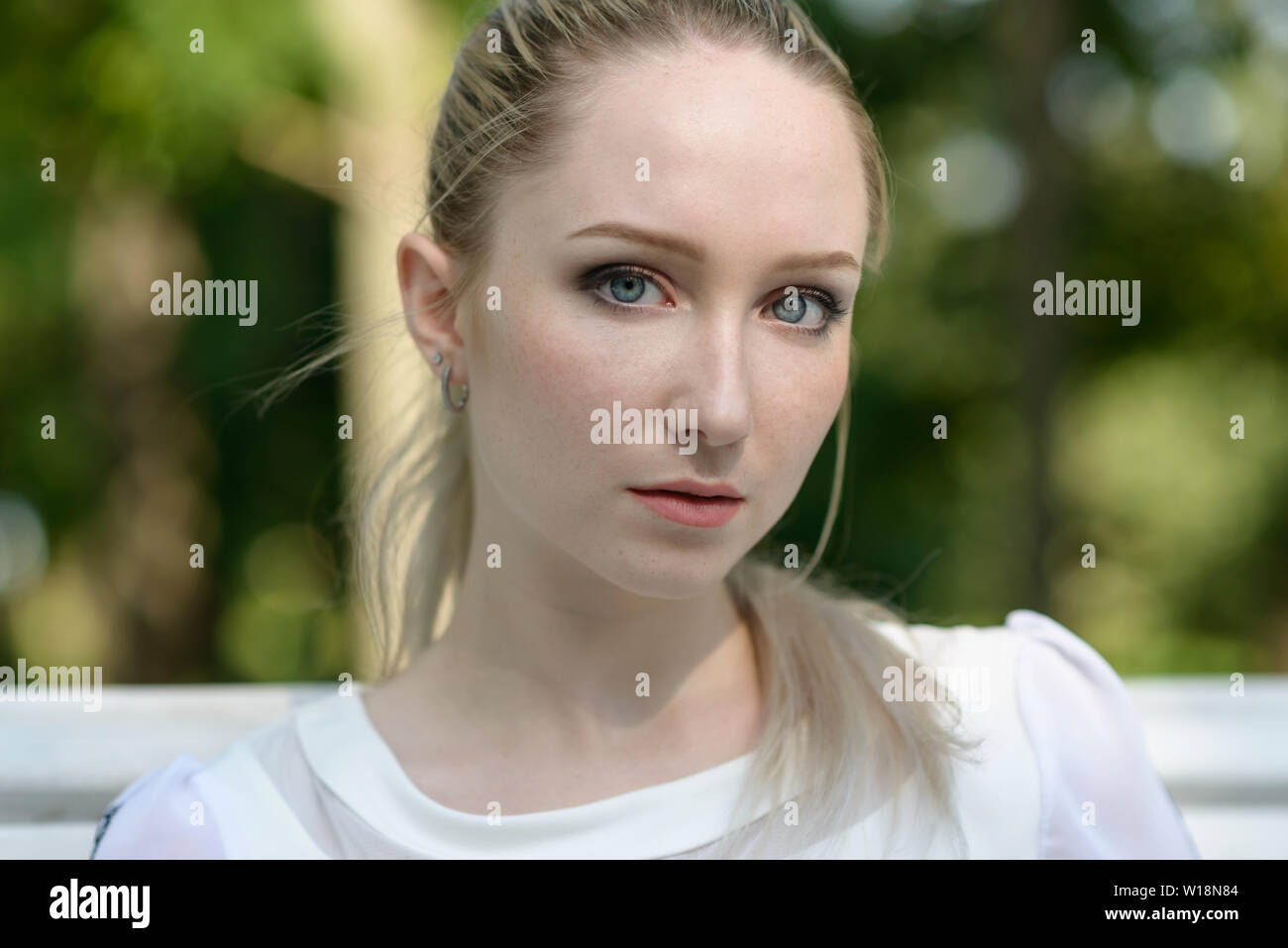 Outdoor portrait of beautiful young woman. Natural light Stock Photo ...