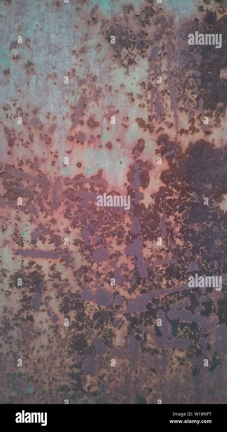 Old metal wall damaged by rust Stock Photo - Alamy