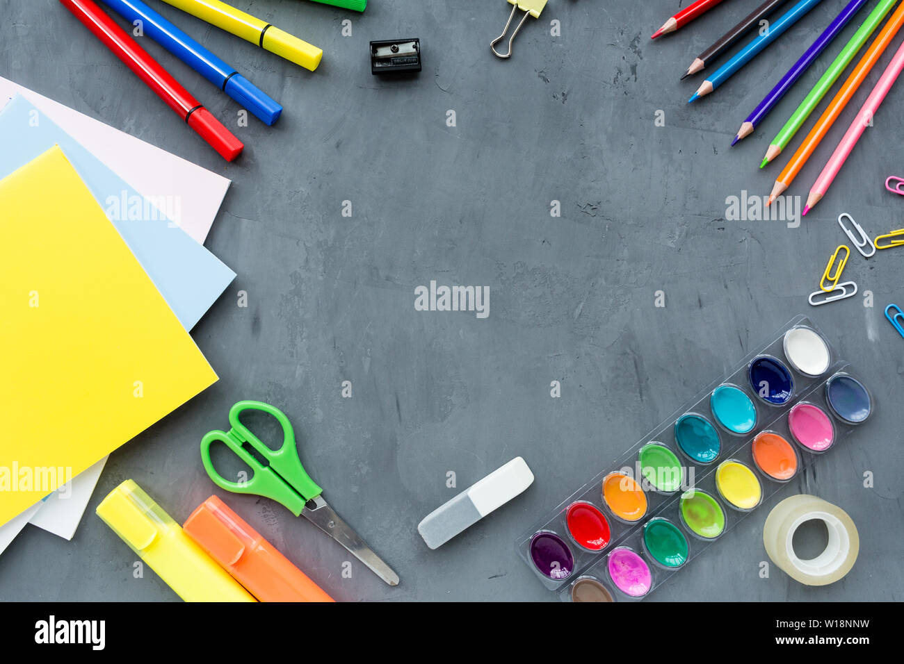 Orange back to school flat lay with bright stationery. School supplies ...