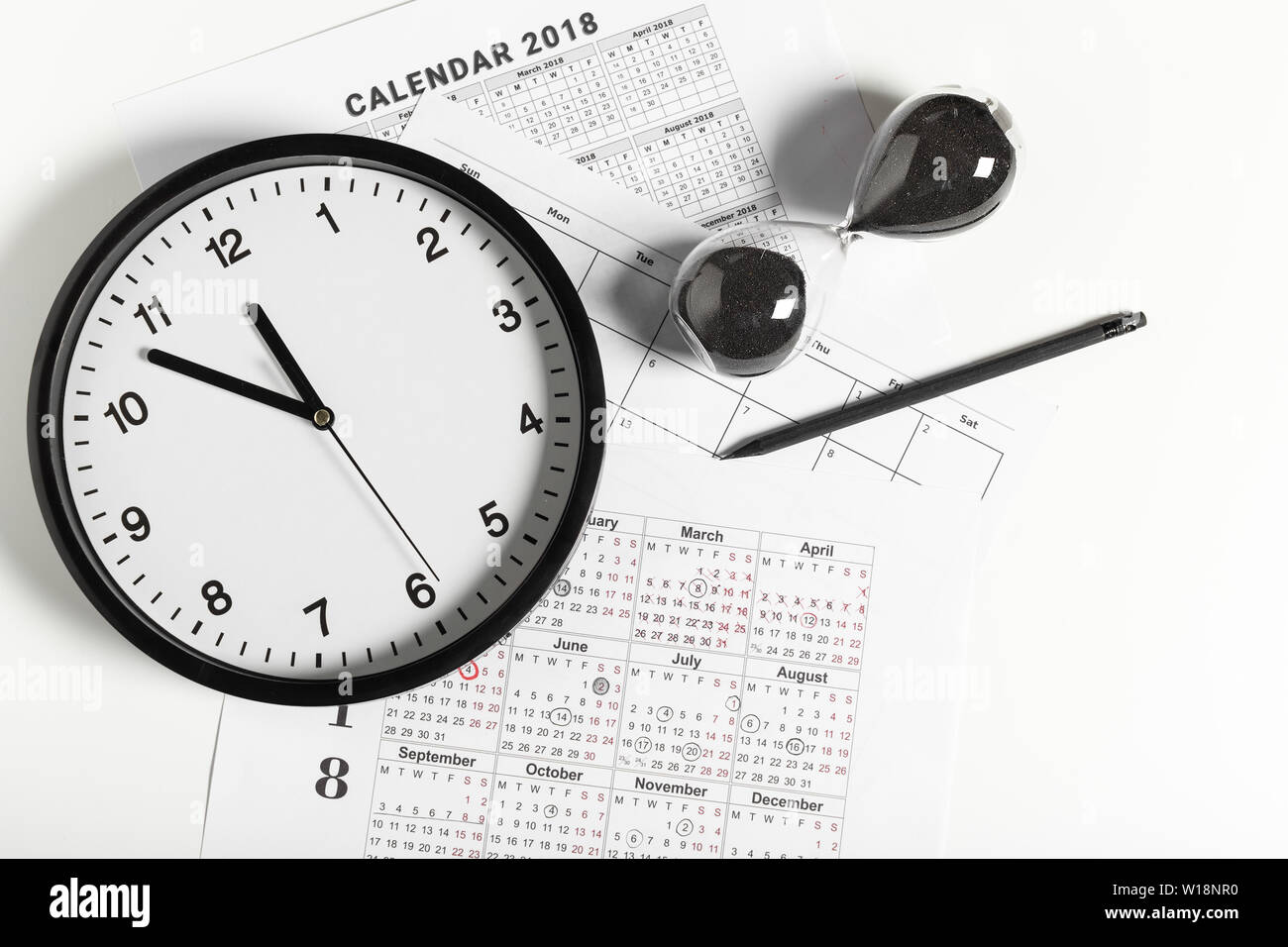Calendar and Clock on White Background Stock Photo - Alamy