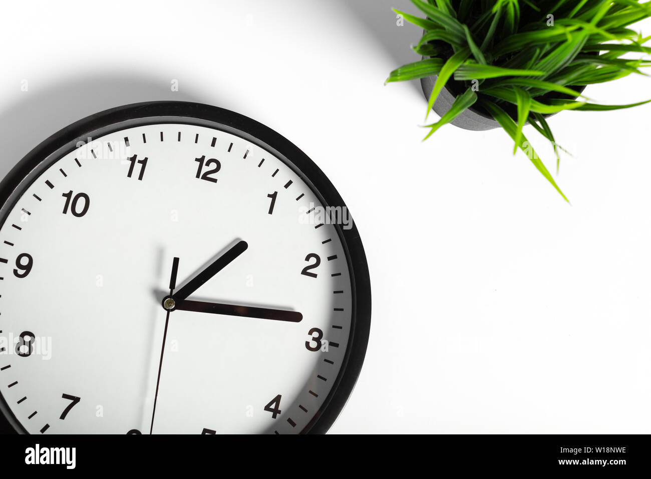 Simple classic black and white round wall clock Stock Photo - Alamy