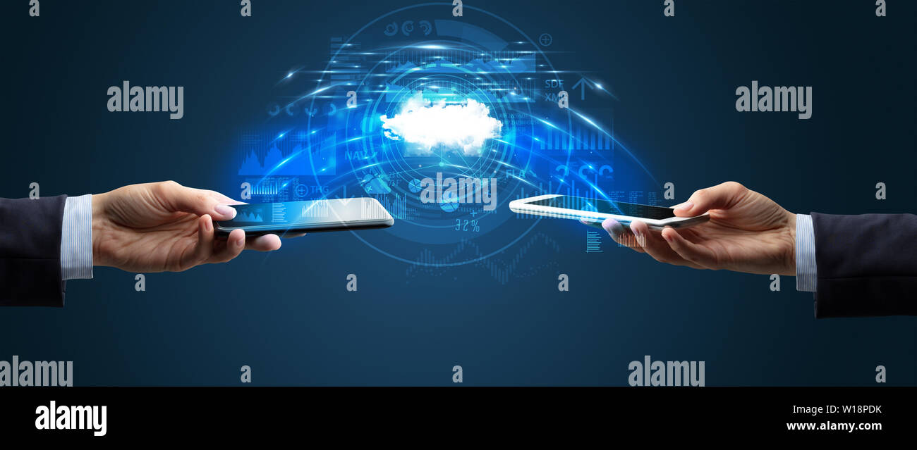 Two smart phones technology transfer hi-res stock photography and images - Alamy