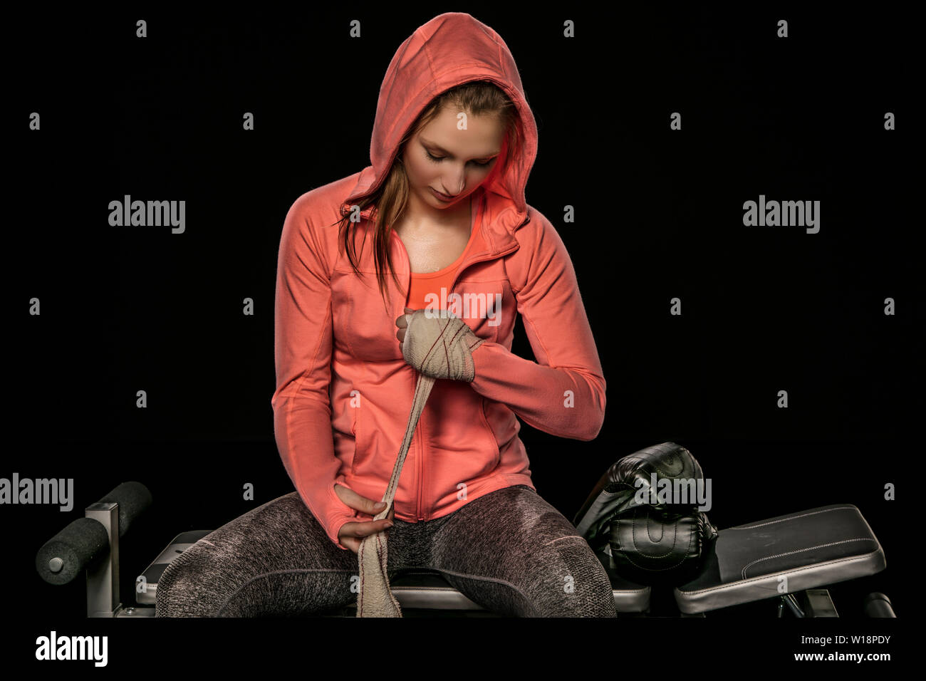 young beautiful girl is getting ready for boxing training Stock Photo ...