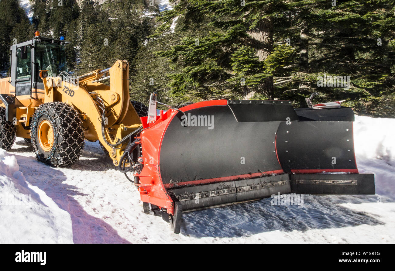 Bulldozer with snow chains hi-res stock photography and images - Alamy