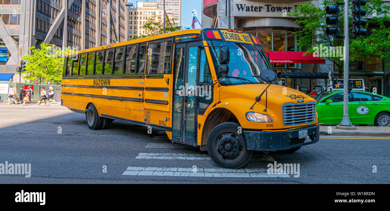 School bus on Michigan Avenue in Chicago - CHICAGO, USA - JUNE 12, 2019 ...