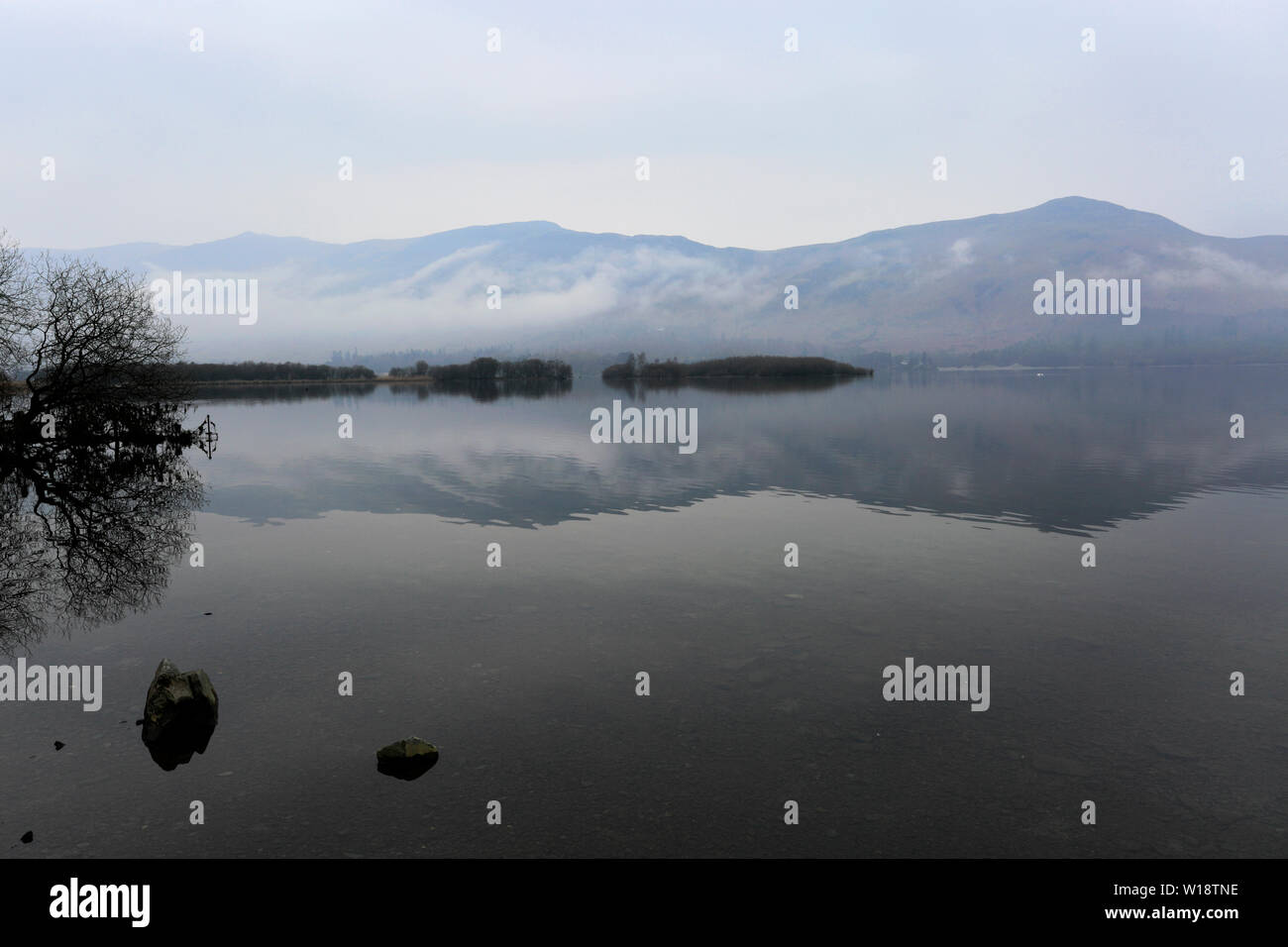 Mist over Derwentwater lake, Keswick town, Lake District National Park ...